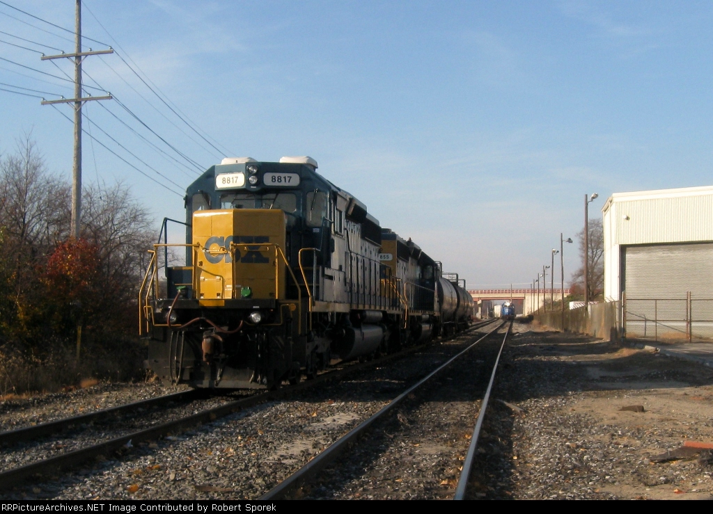 Idling SD40-2s With a Conrail in the Background